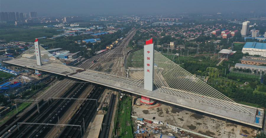 China's new architectural wonder: a 46,000-tonne bridge rotates ...
